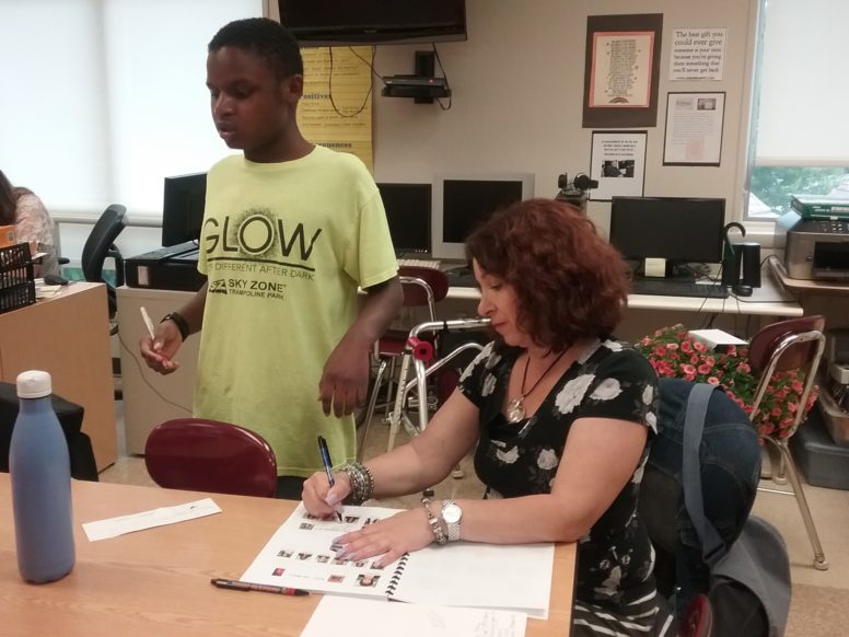 Year Book Signing at Alpha High School - Alpha School